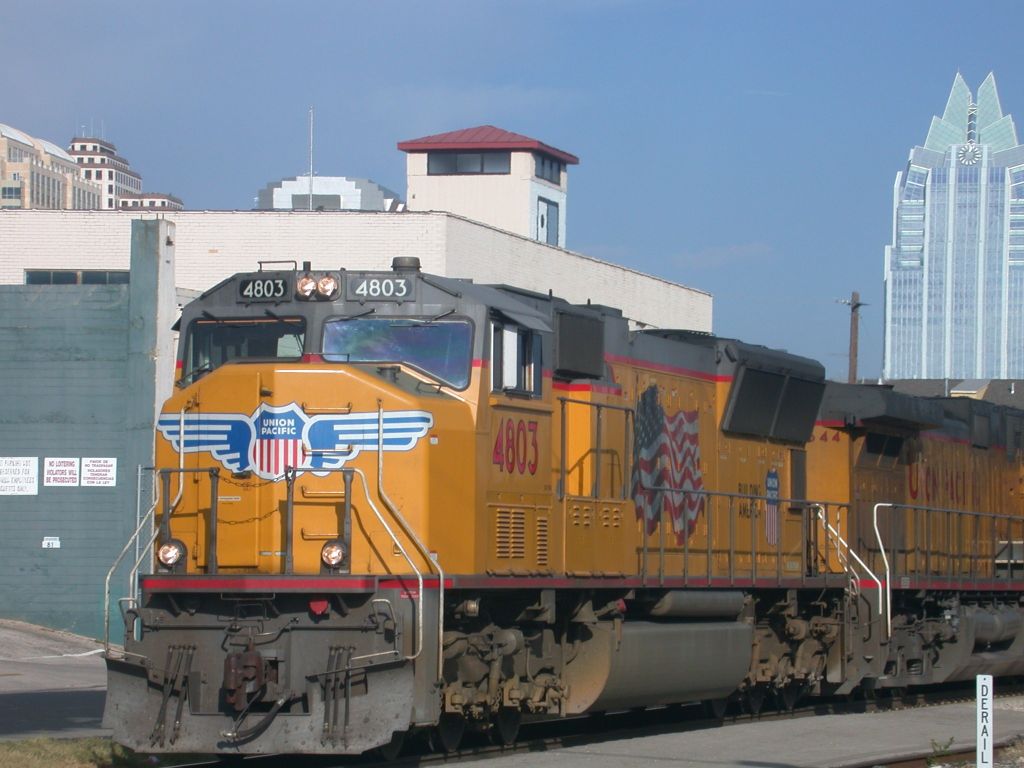 UP 4803 19Aug2004 NB through AMTRAK station with mostly Auto Racks mix